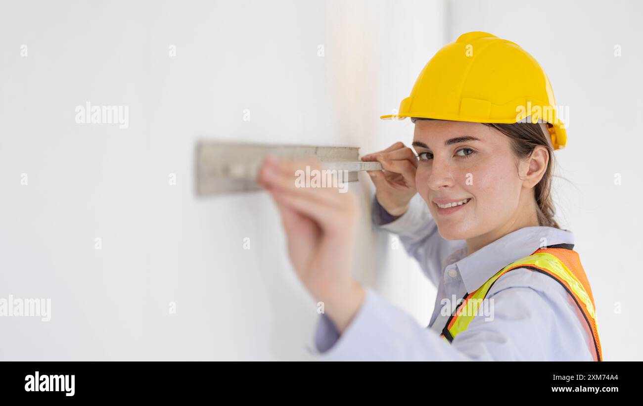 Beauty women construction worker model with Cement wall Plastering Tool ...