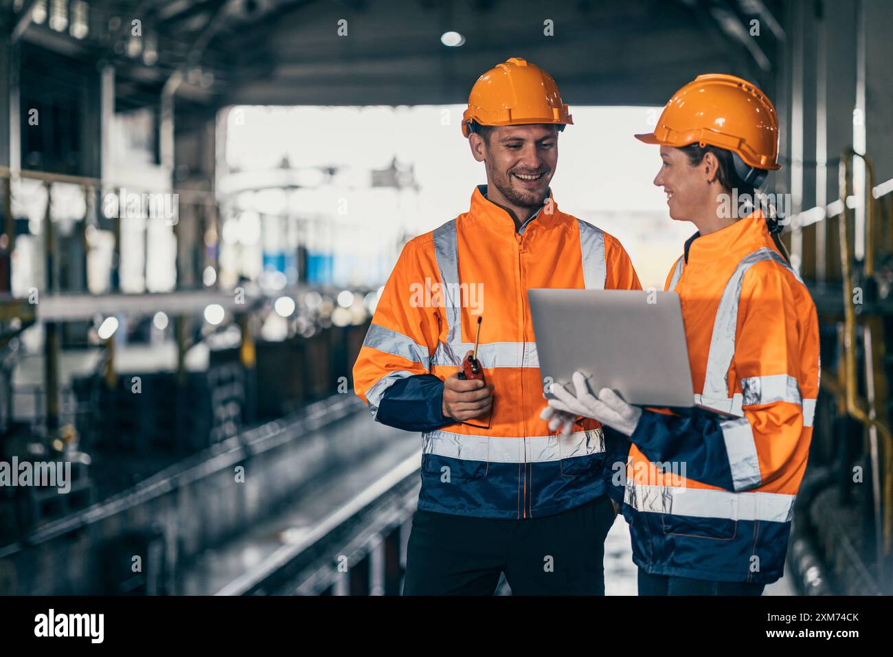 Happy smiling engineer talking hi-res stock photography and images - Alamy
