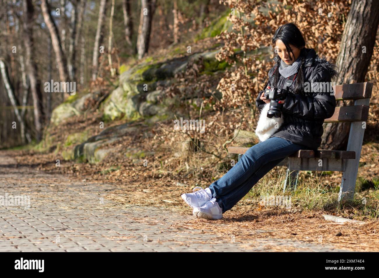 Young asian female photographer sitting hi-res stock photography and ...