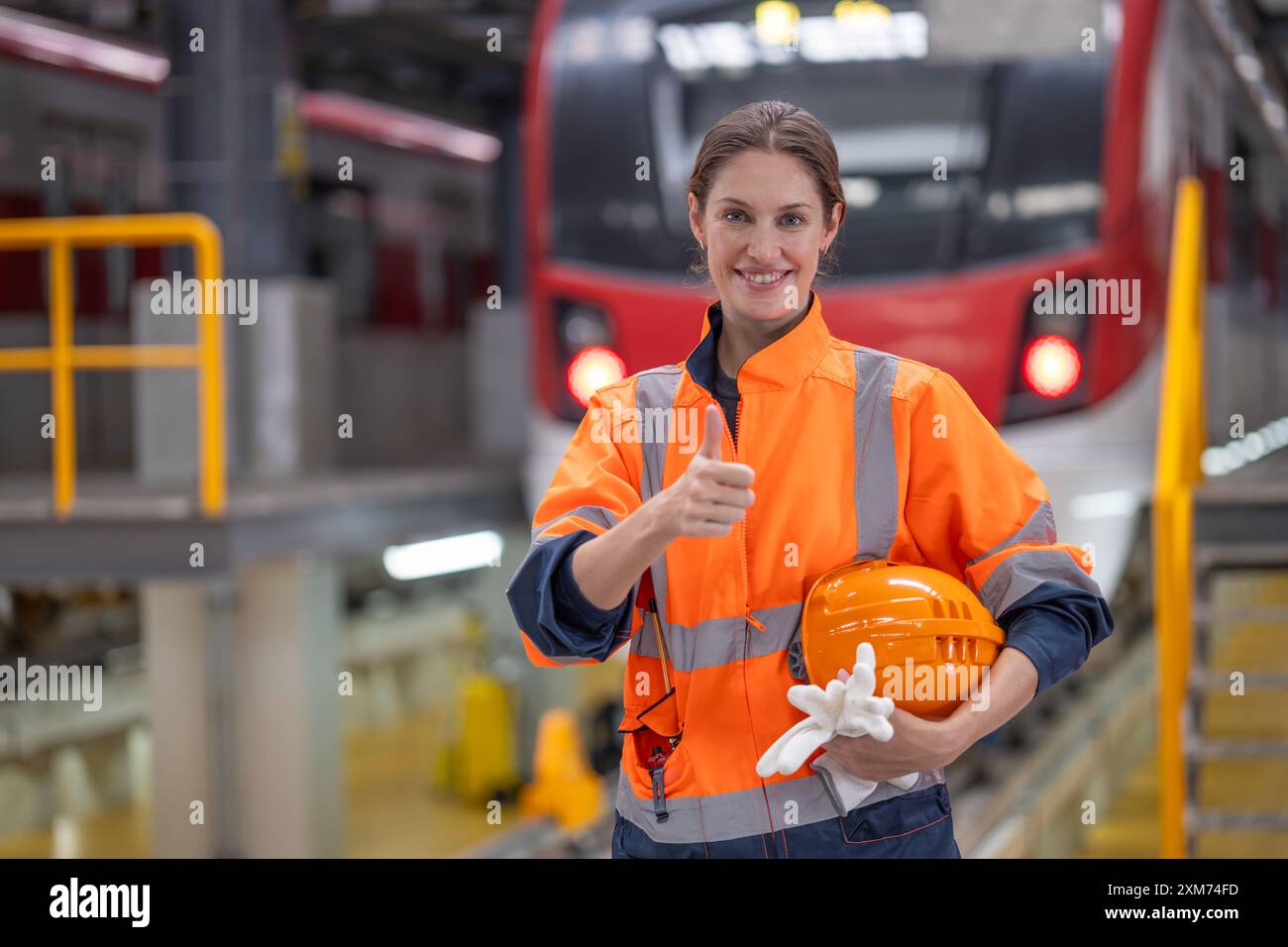 Portrait engineer women electric train underground locomotive service ...
