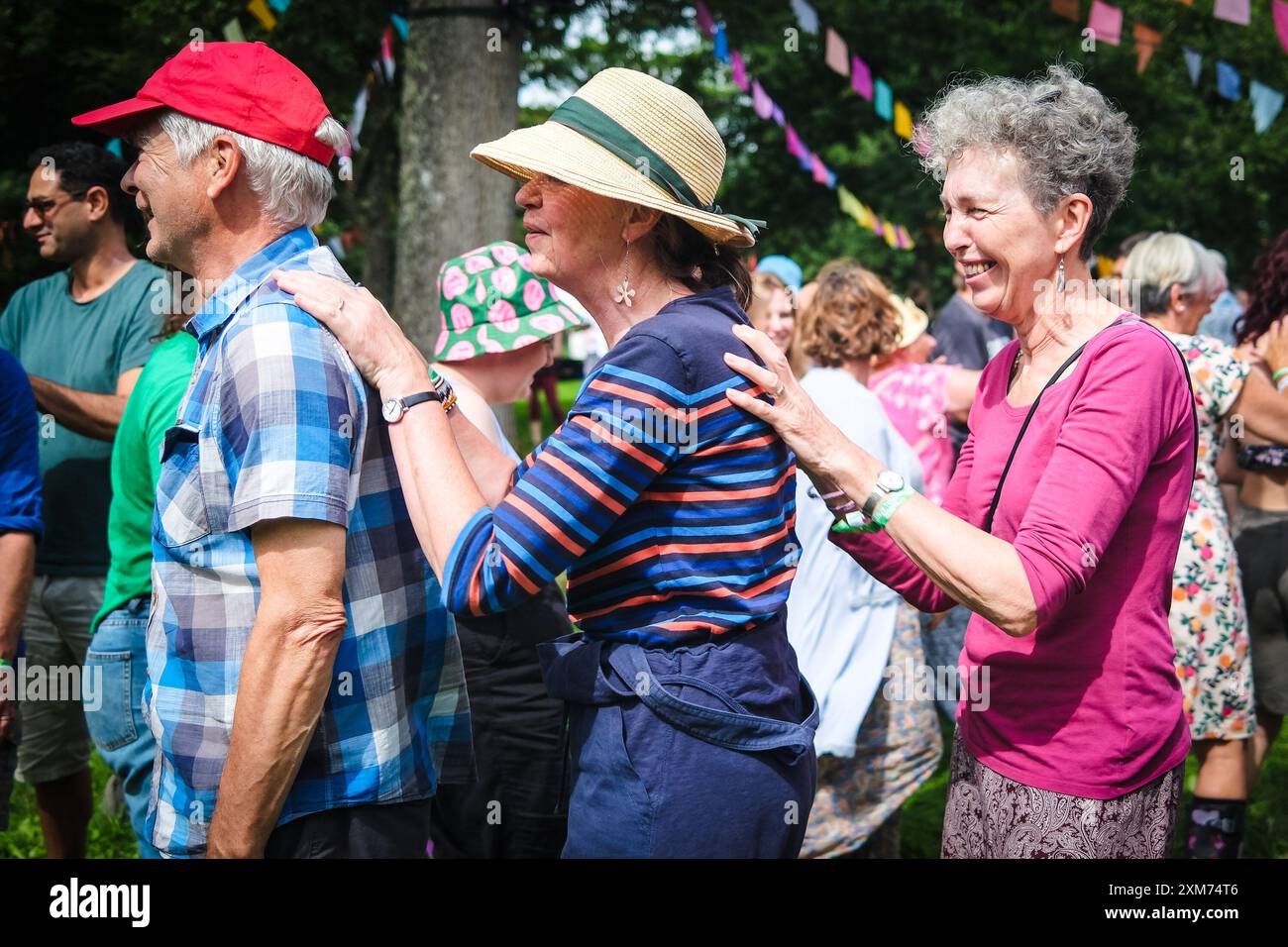 Malmesbury, UK. 26th July, 2024. Laughter Yoga during Womad - World of ...