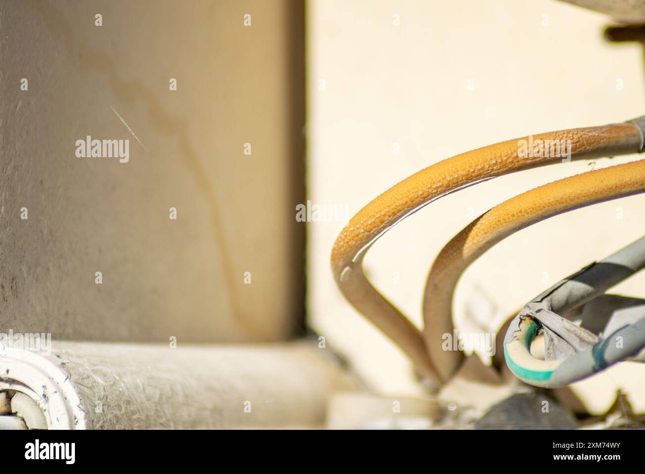 detailed view of deteriorated cables of an old electrical installation ...