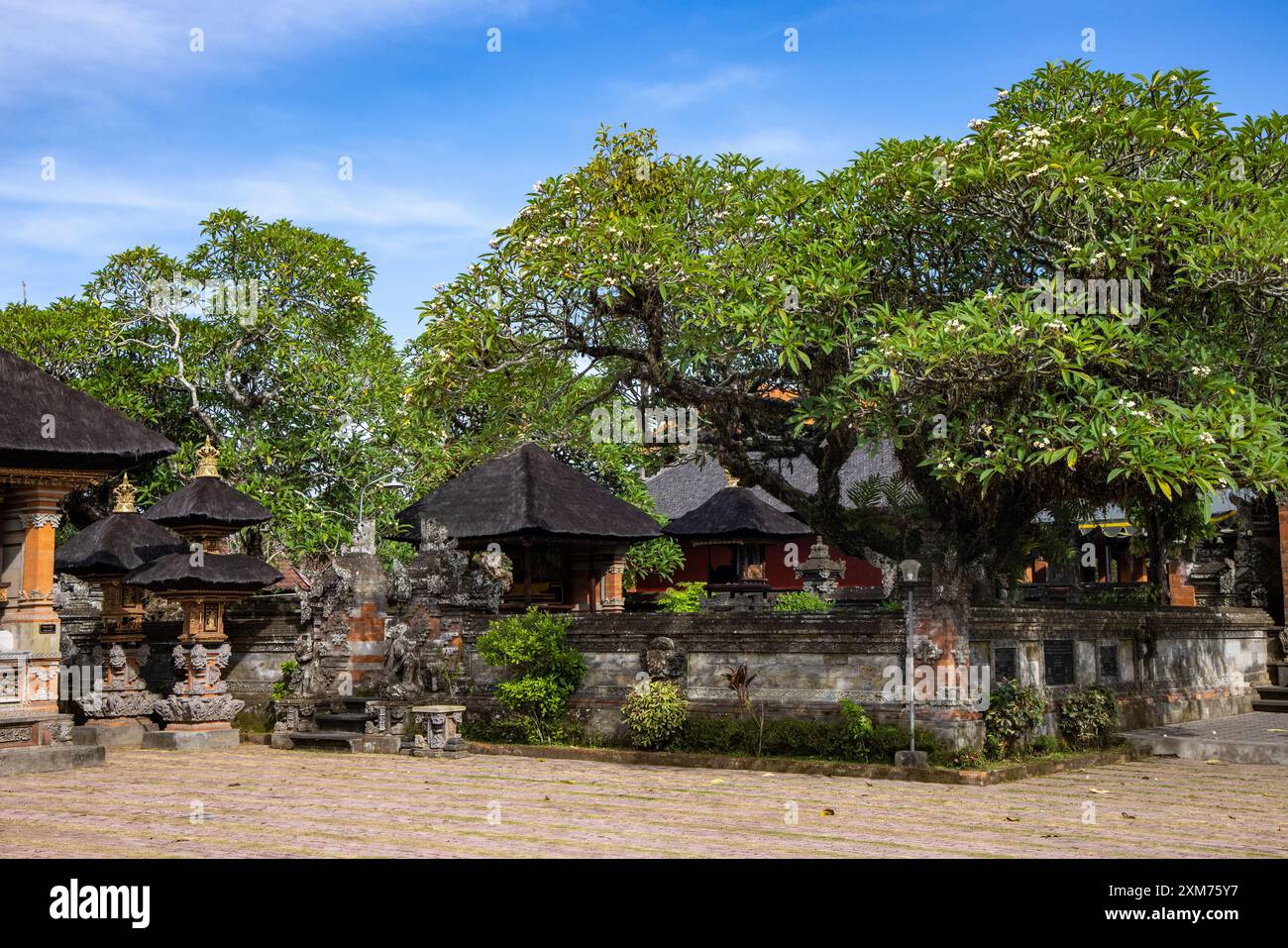 Stone carvings and sculptures and trees at Pura Puseh Desa Batuan Hindu ...