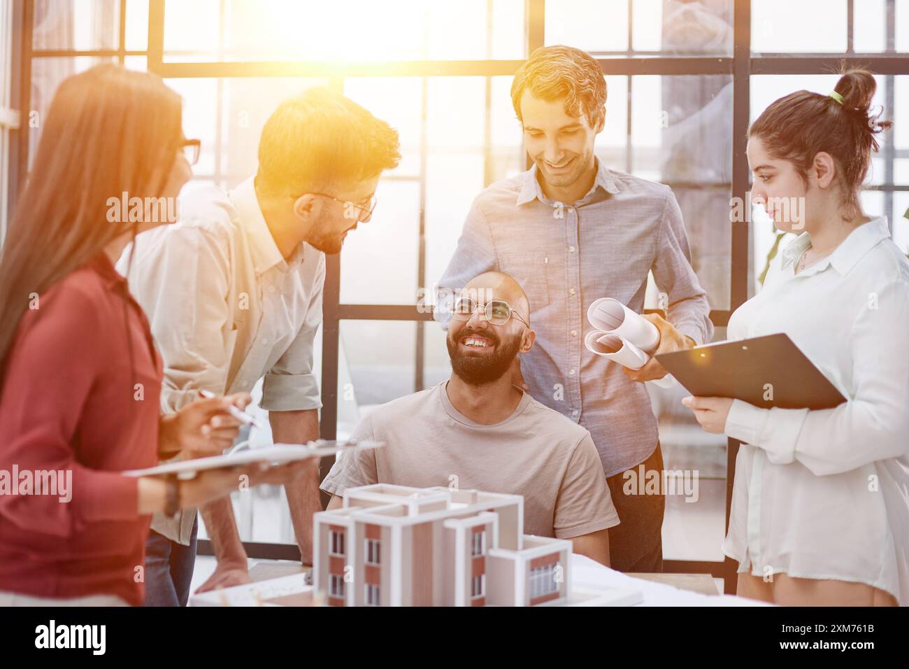 Team architects designing building model hi-res stock photography and ...