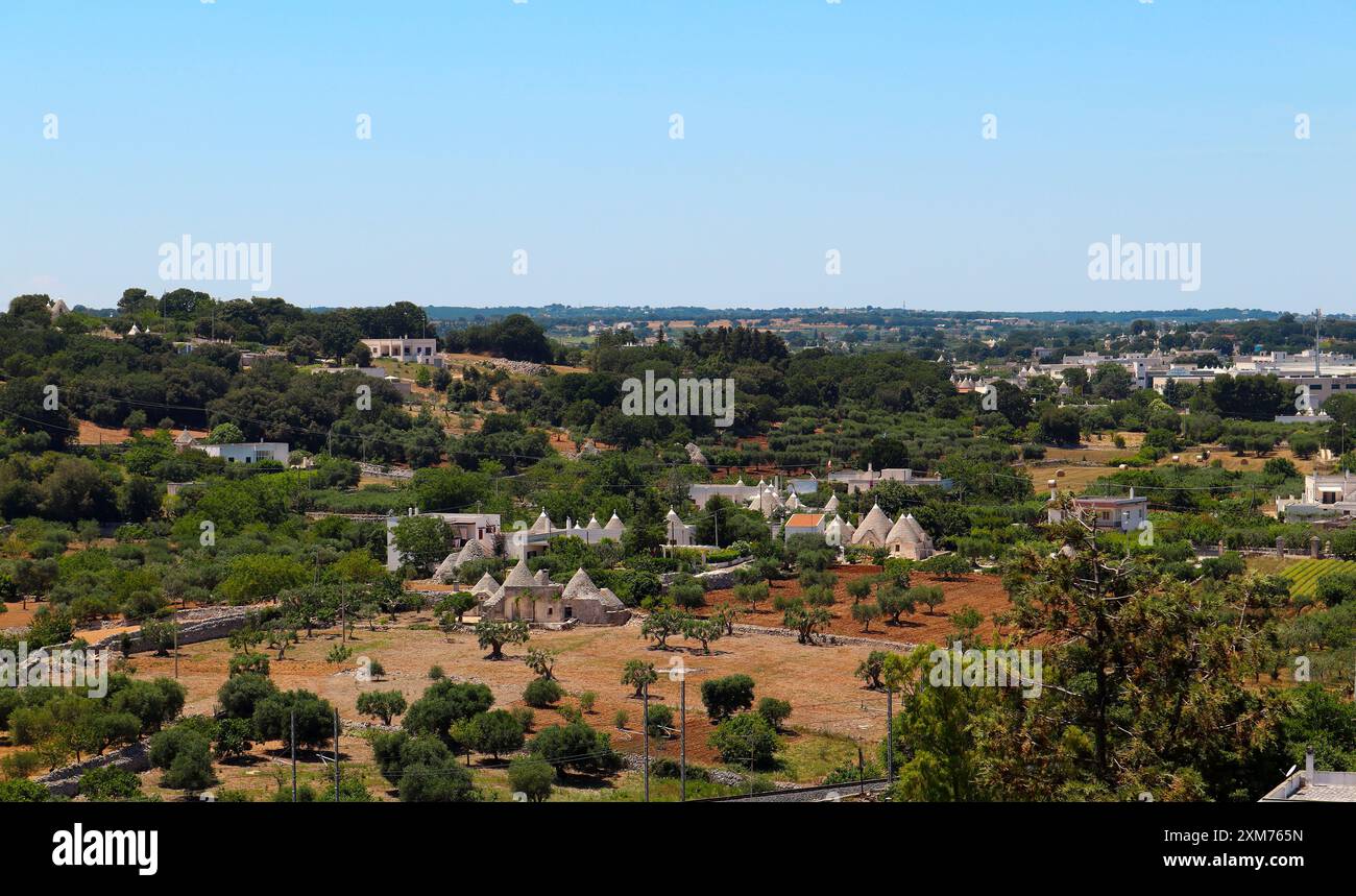 Apulian landscape with trulli houses, the traditional Apulian dry stone ...