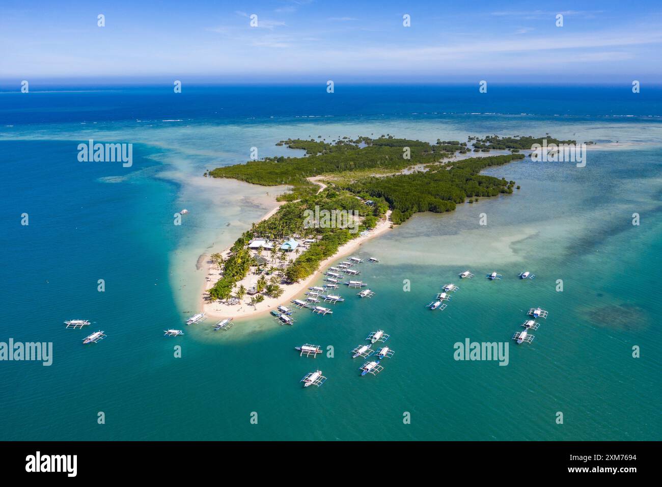 Aerial photographs of Bangka outrigger canoe tour boats on Cowrie ...