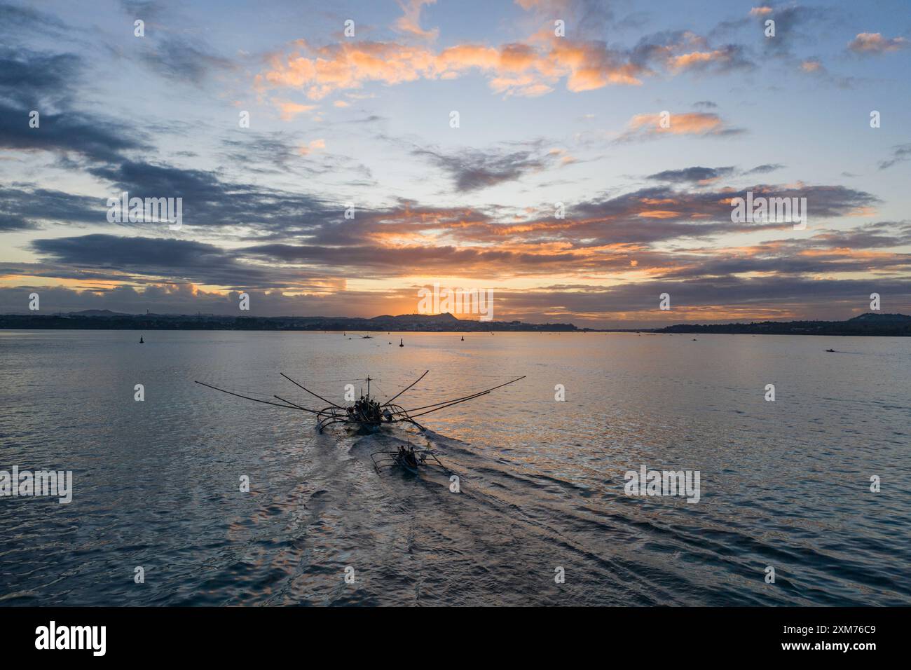 Aerial view of a traditional Bangka outrigger canoe fishing boat at ...
