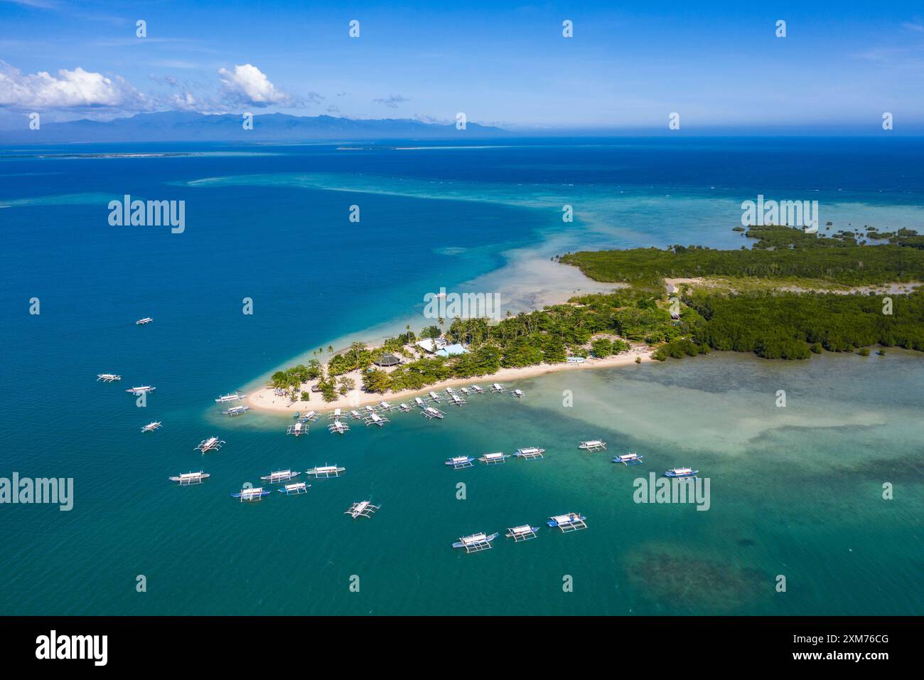 Aerial photographs of Bangka outrigger canoe tour boats on Cowrie ...