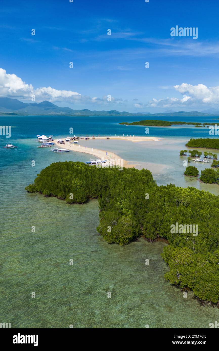 Aerial view of mangroves, sandbar and Bangka outrigger canoe tour boats ...