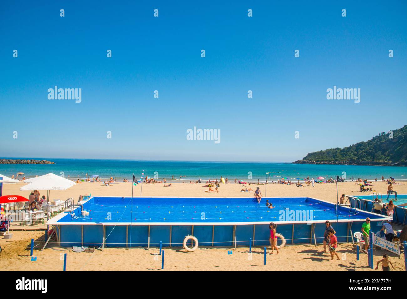 Swimming pool in La Zurriola beach. San Sebastian, Spain Stock Photo ...
