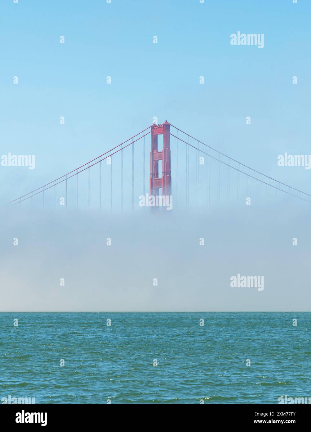Golden Gate Bridge in a foggy weather. Only one tower is visible ...