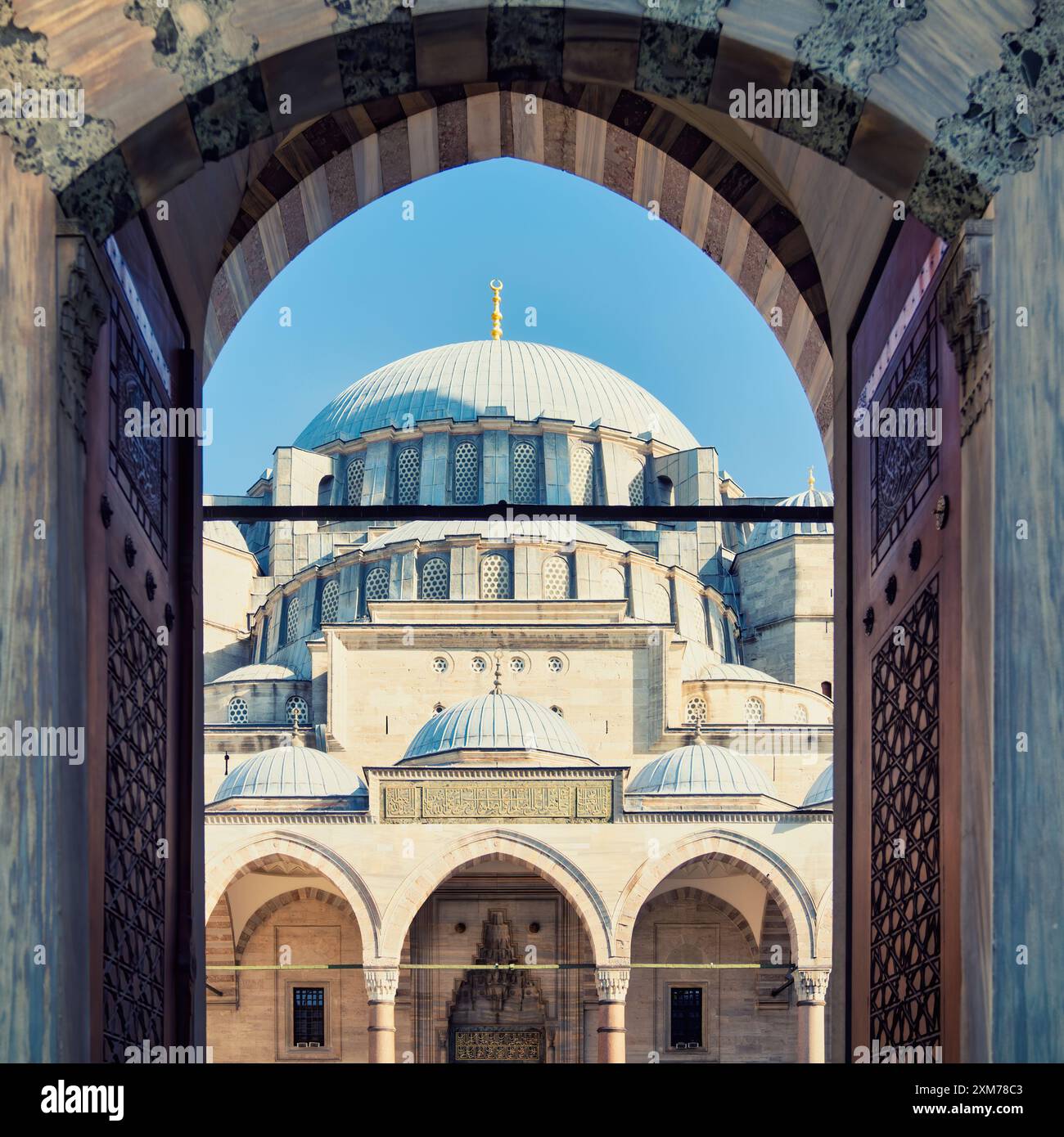 Suleymaniye Mosque architecture details with dome and entrance door ...