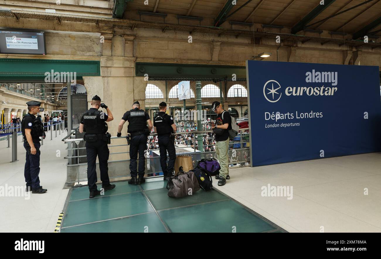 Paris, France. 26th July, 2024. French Police observe at the main Gare ...