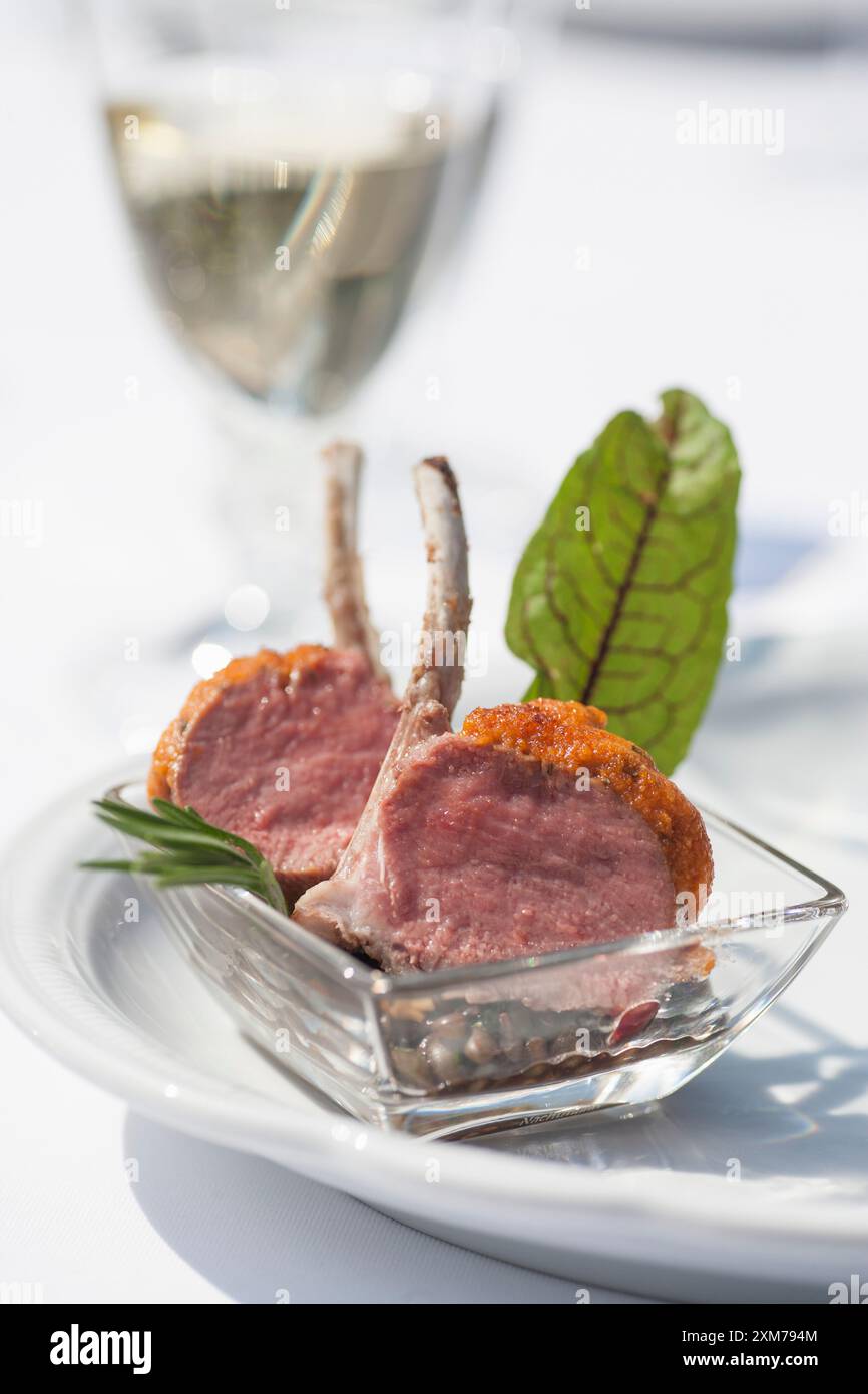 Lamb chops with chard on lentils Stock Photo - Alamy