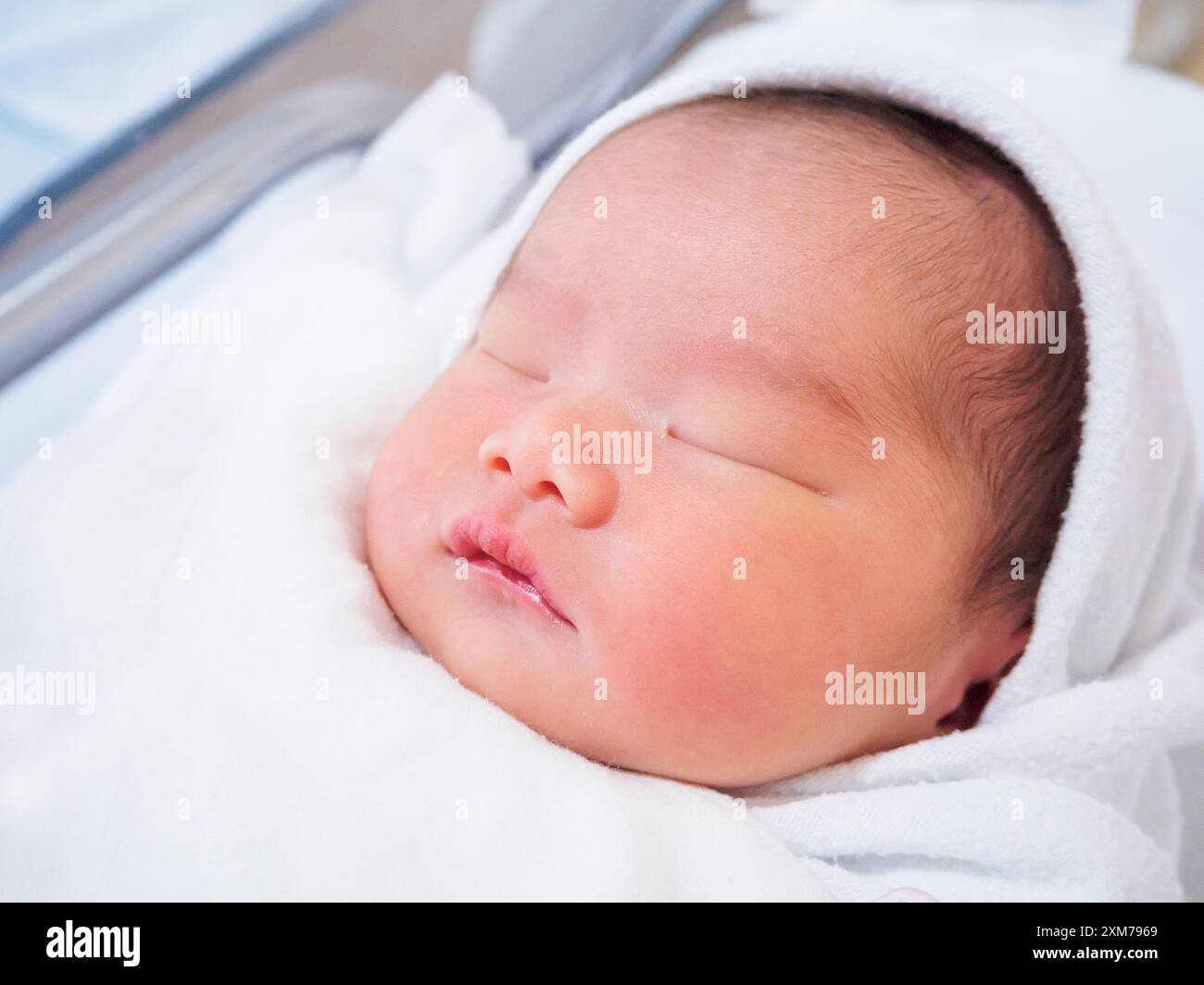 Cute newborn asian baby girl sleeping Stock Photo - Alamy
