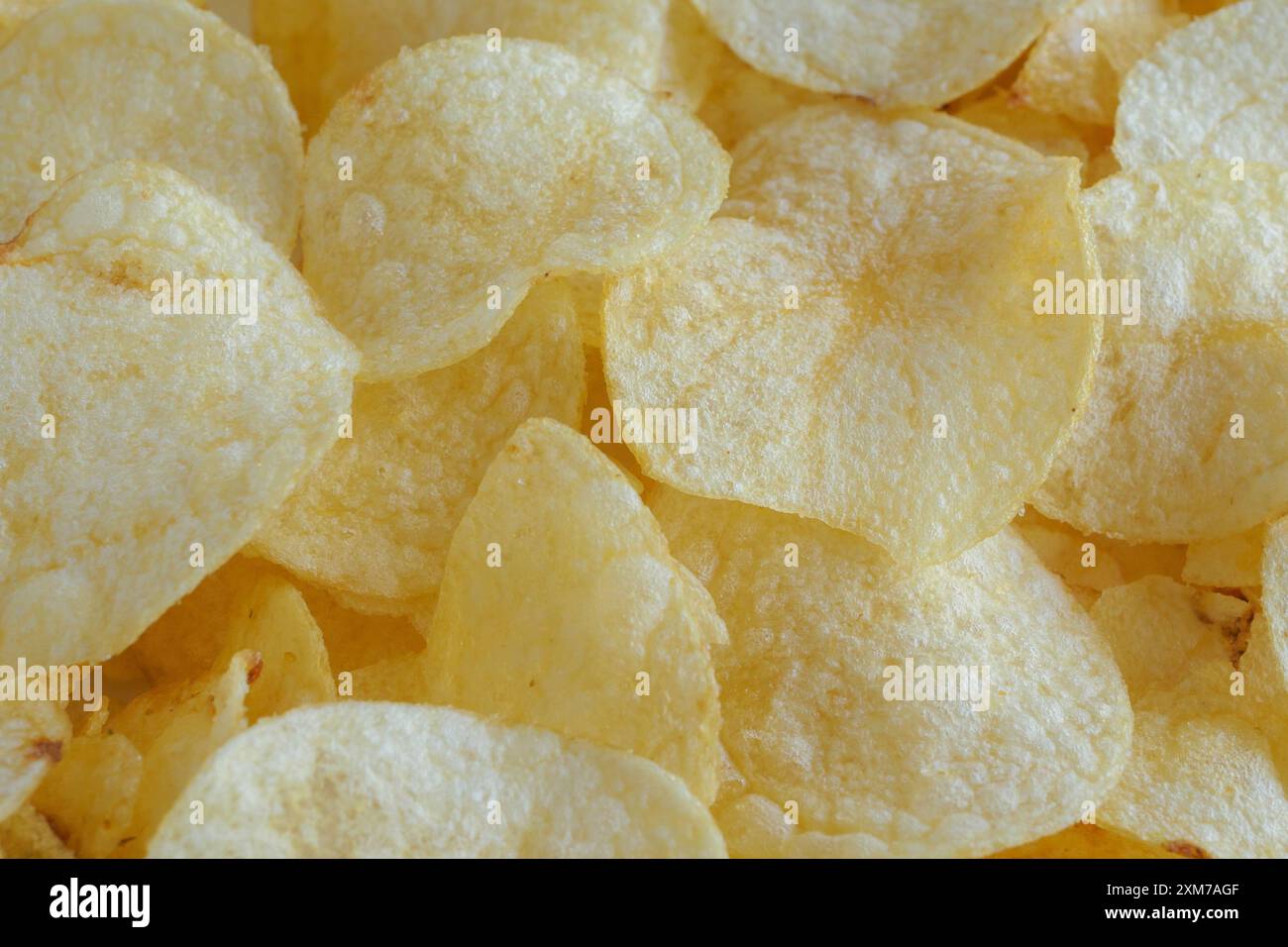 crispy potato chips snack texture background Stock Photo - Alamy