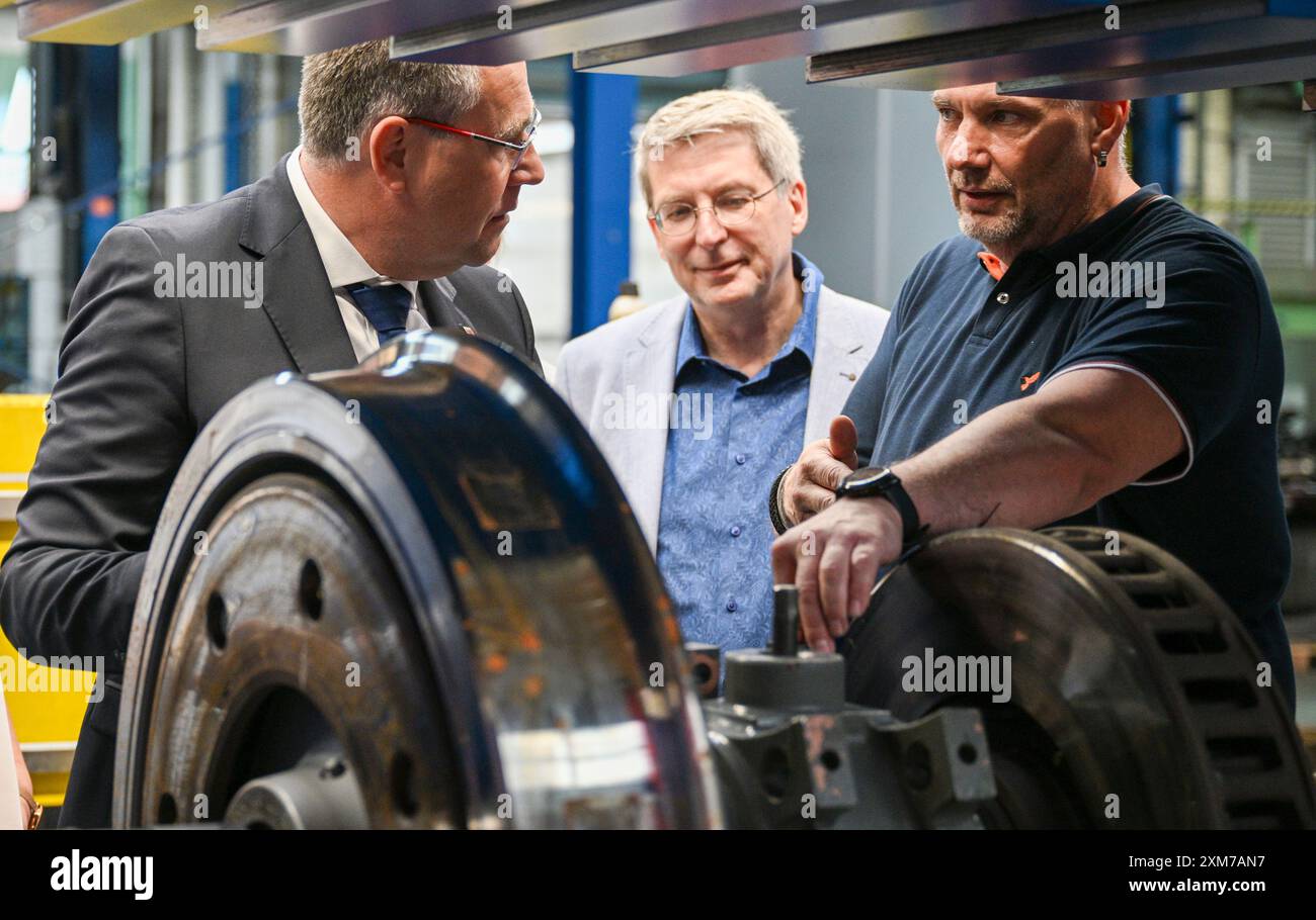 Wittenberge, Germany. 26th July, 2024. Rainer Genilke (l-r, CDU ...