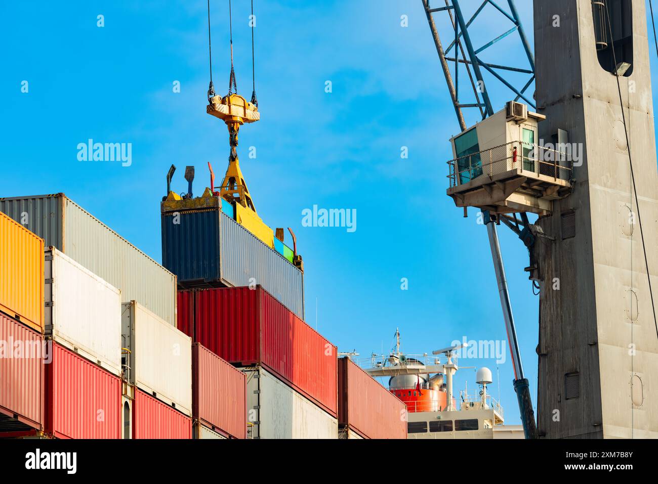 Cargo ship being loaded with containers at port in Chile Stock Photo ...