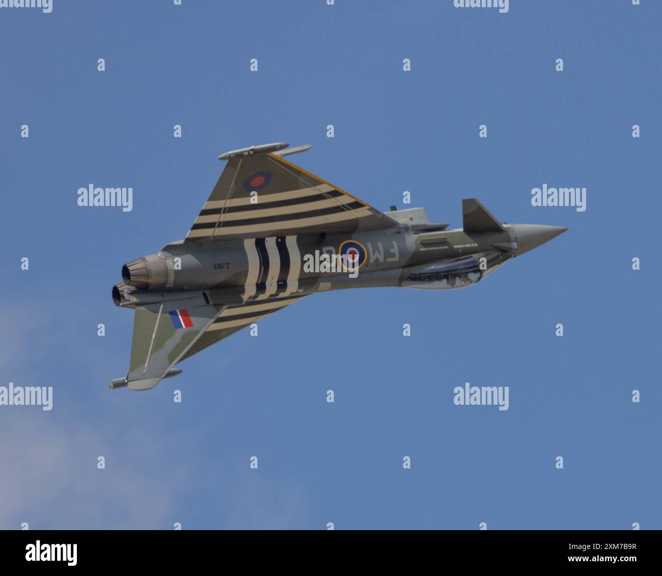 An RAF Eurofighter GR4 in D-day stripes livery flying at the 2024 Royal ...