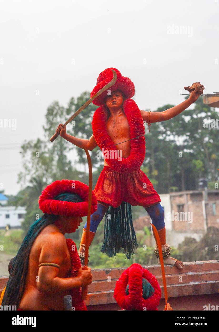 Hindu devotees covered with orange color dancing with swords at Lal ...