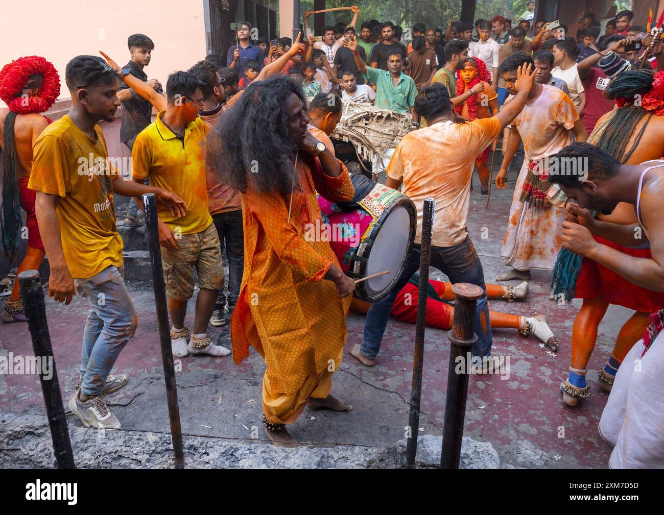 Hindu devotees covered with orange color in Lal Kach festival, Dhaka ...