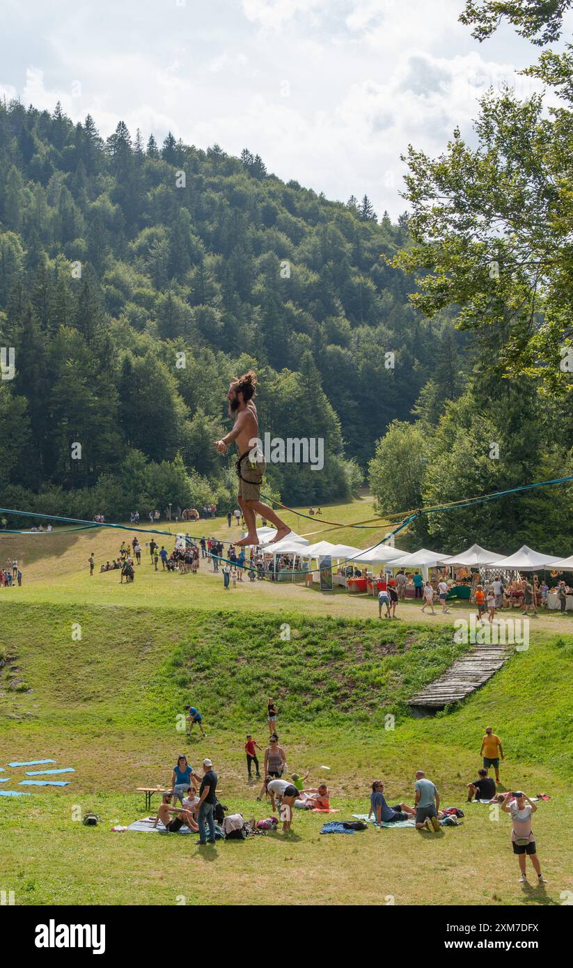 Serina Italy July 21, 2024: Tightrope walker walking on a rope ...