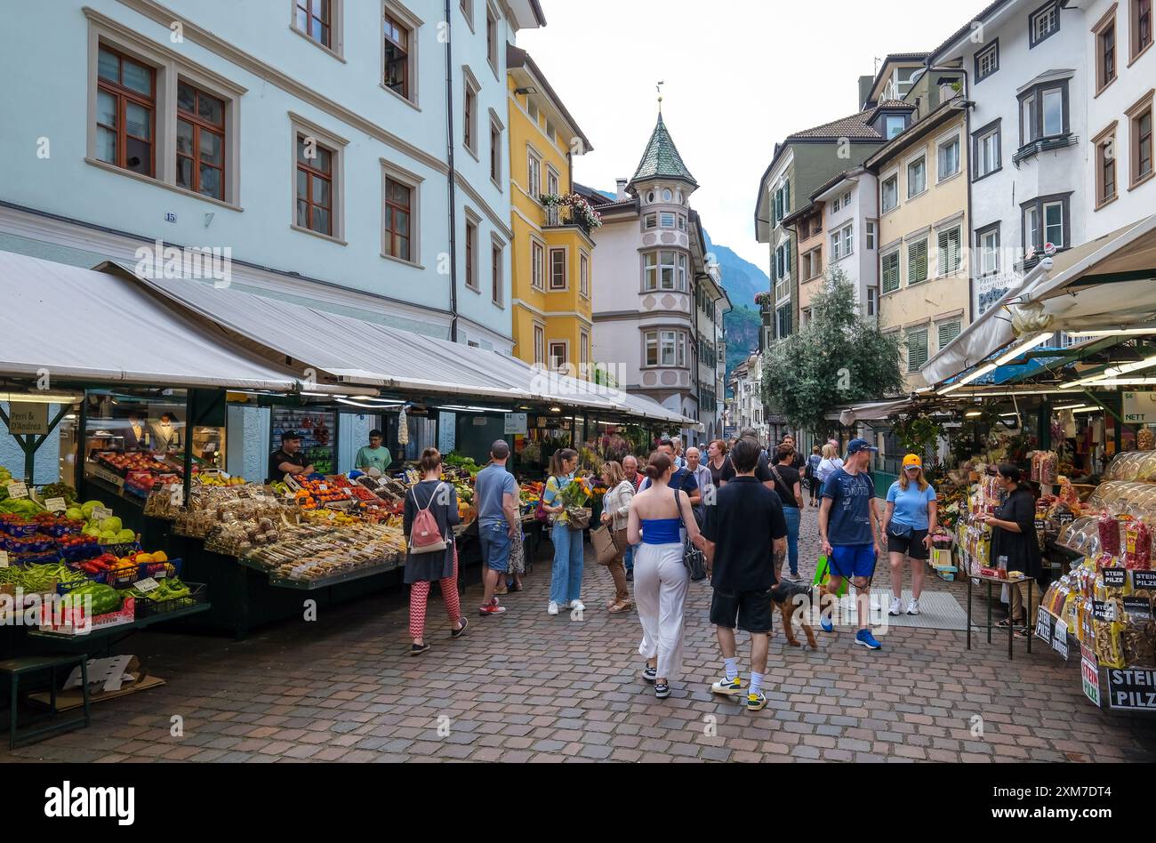 Bolzano, South Tyrol, Italy - Passers-by stroll through the fruit ...