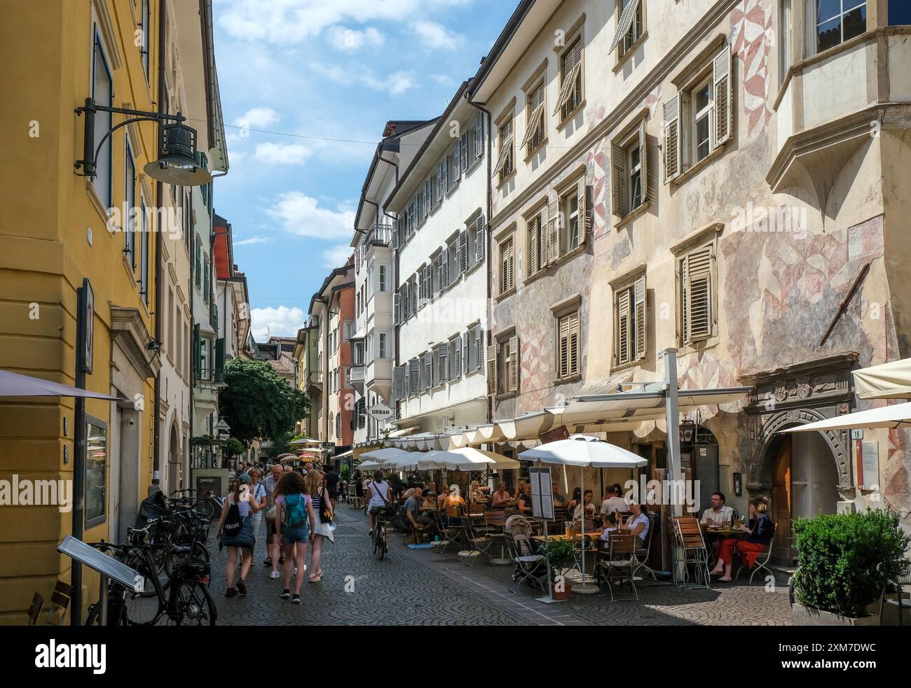 Bolzano, South Tyrol, Italy - Passers-by stroll through the alleyways ...