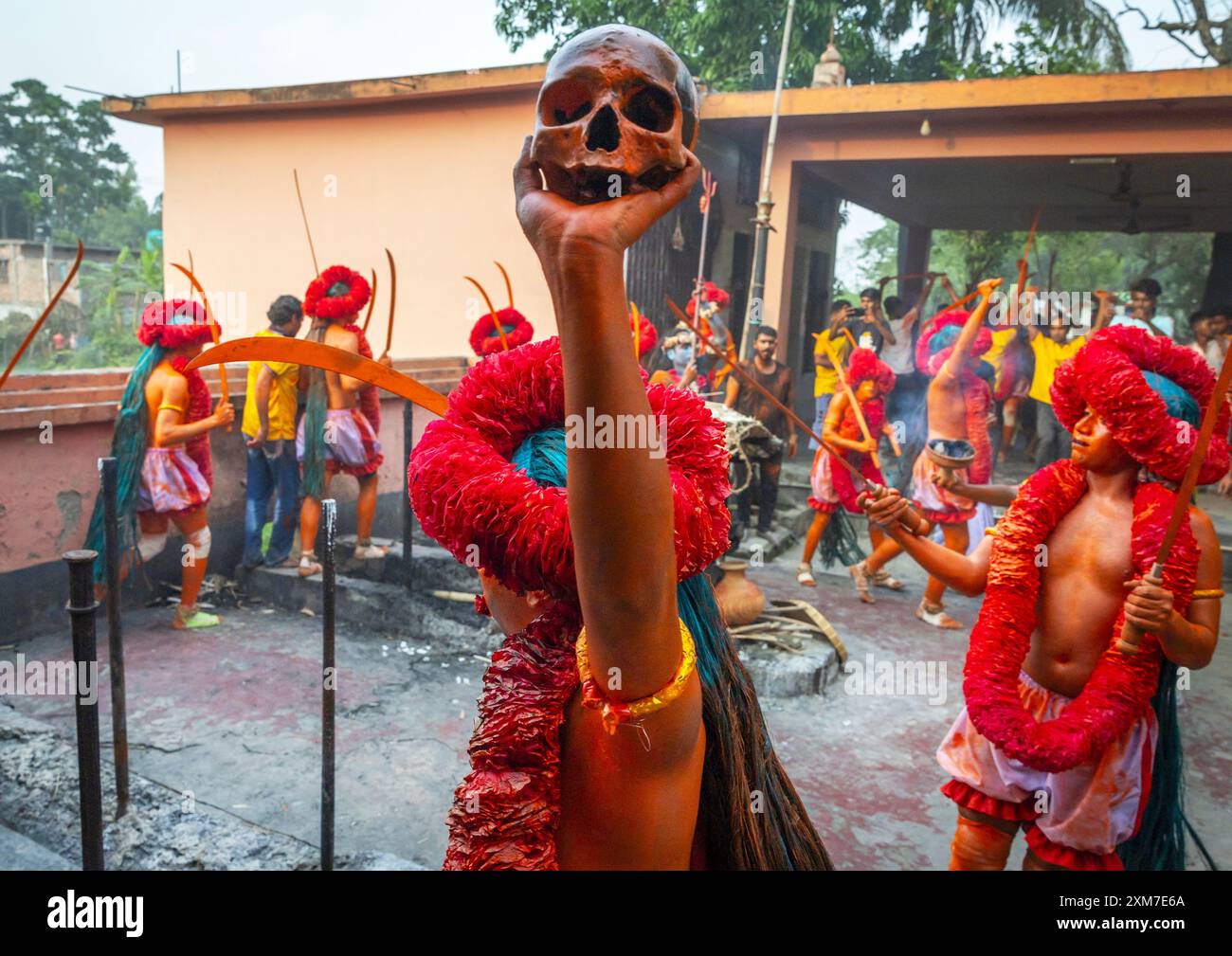 Portrait of a Hindu devotee covered with orange color in Lal Kach ...