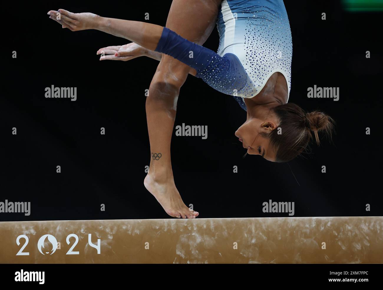 Marine Boyer of France practices on the balance beam during a ...