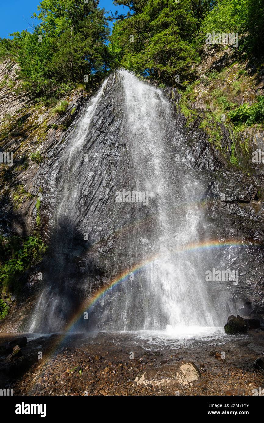 Cascade du Queureuilh waterfall at sunset located in Mont-Dore in the ...