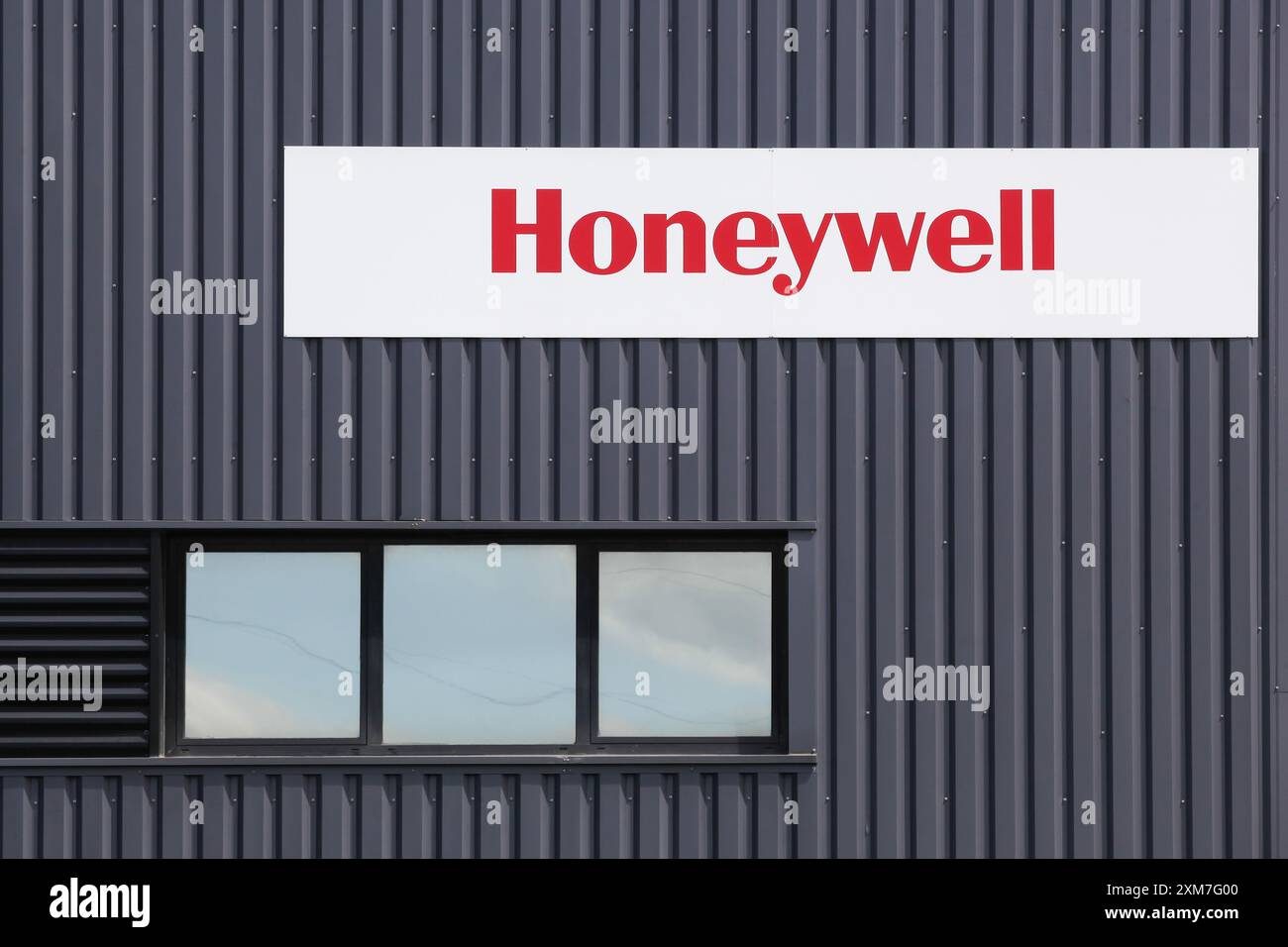 Honeywell logo on a building. Honeywell is an American multinational ...
