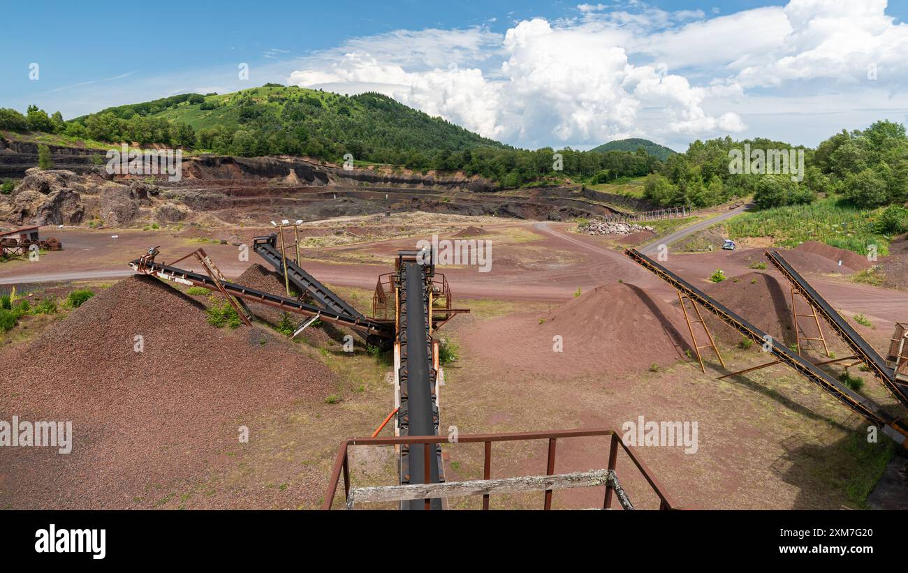 Interior of the french volcano Lemptégy with extrating machines in the ...