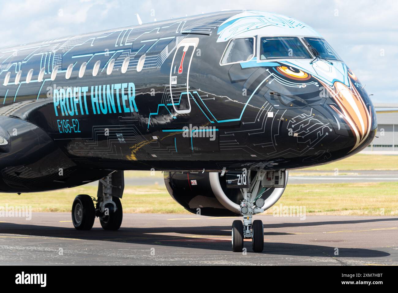 Embraer E195-E2 airliner named Profit Hunter taxiing at the Farnborough ...