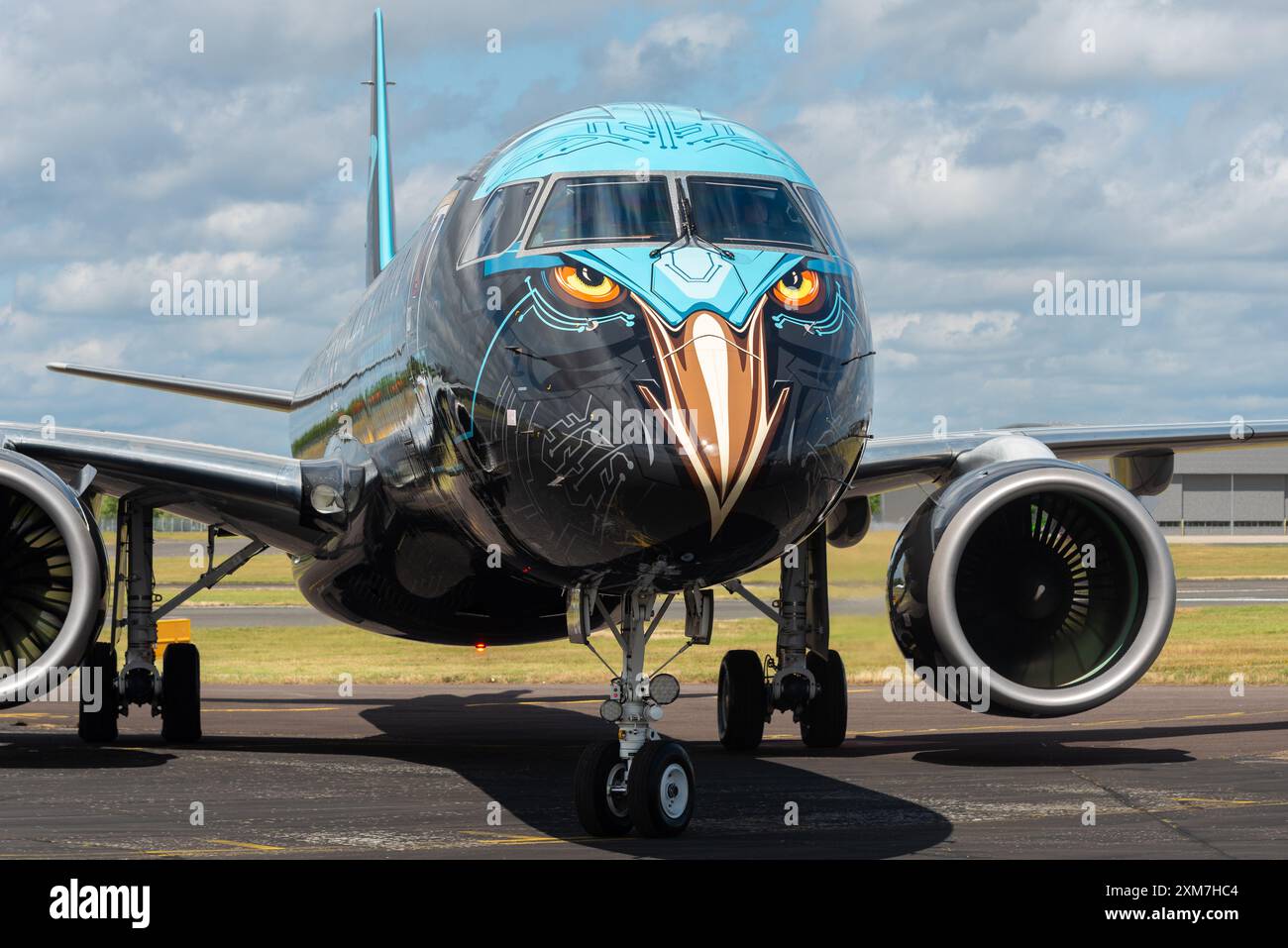 Embraer E195-E2 airliner named Profit Hunter taxiing at the Farnborough ...