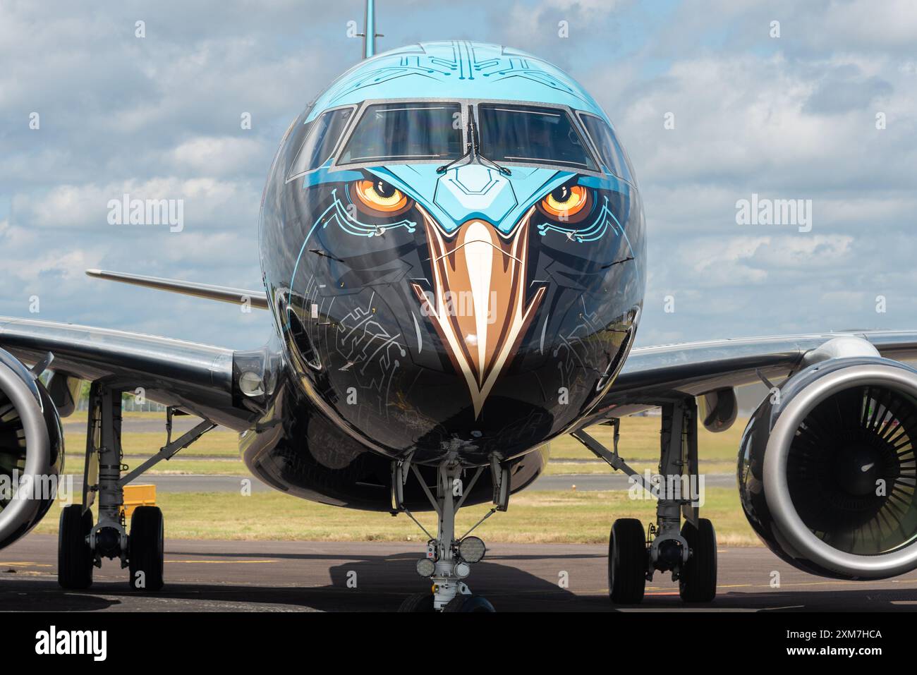 Embraer E195-E2 airliner named Profit Hunter taxiing at the Farnborough ...