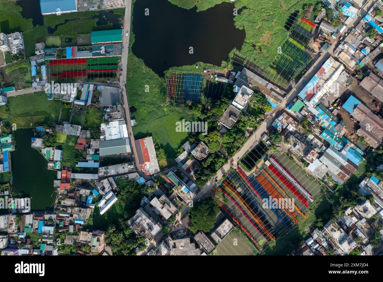 Aerial view of drying dyed clothes in various dyeing factories at ...