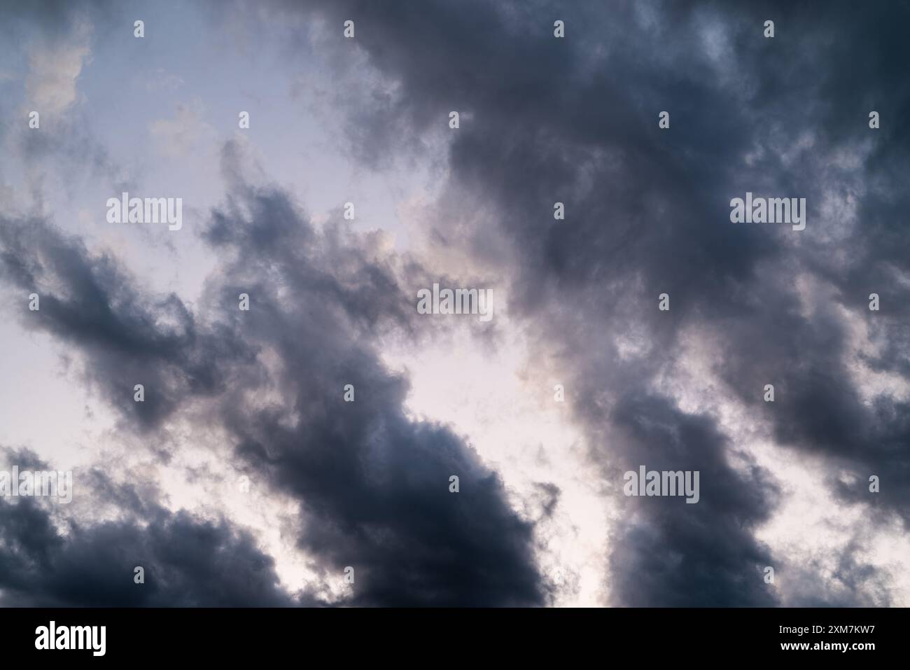 Cloudy sky background, dramatic clouds and blue sky breakthrough ...