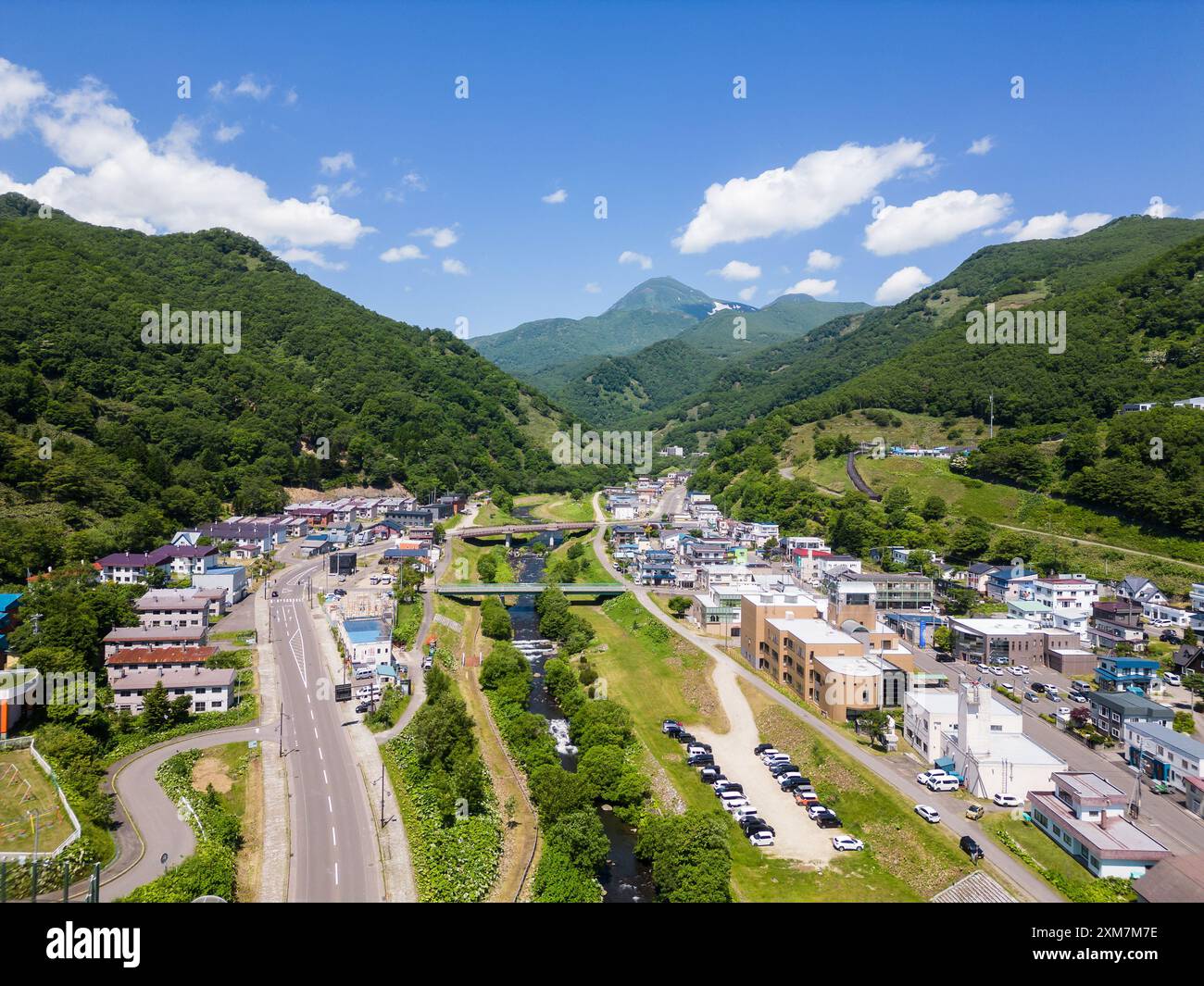 Rausu, Hokkaido: Aerial view of the Rausu town and volcano in the ...