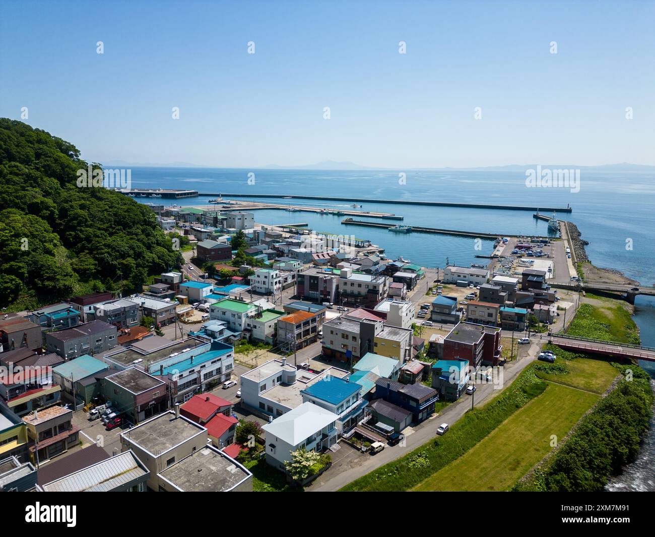 Rausu, Hokkaido: Aerial drone view of the Rausu town and harbor in the ...