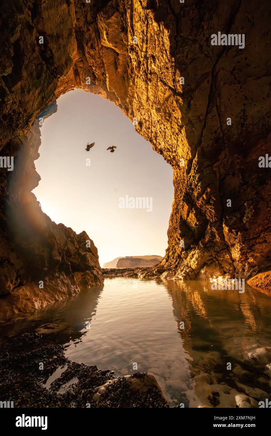 Freshwater Bay in a low sun from the caves with vibrant colours over ...