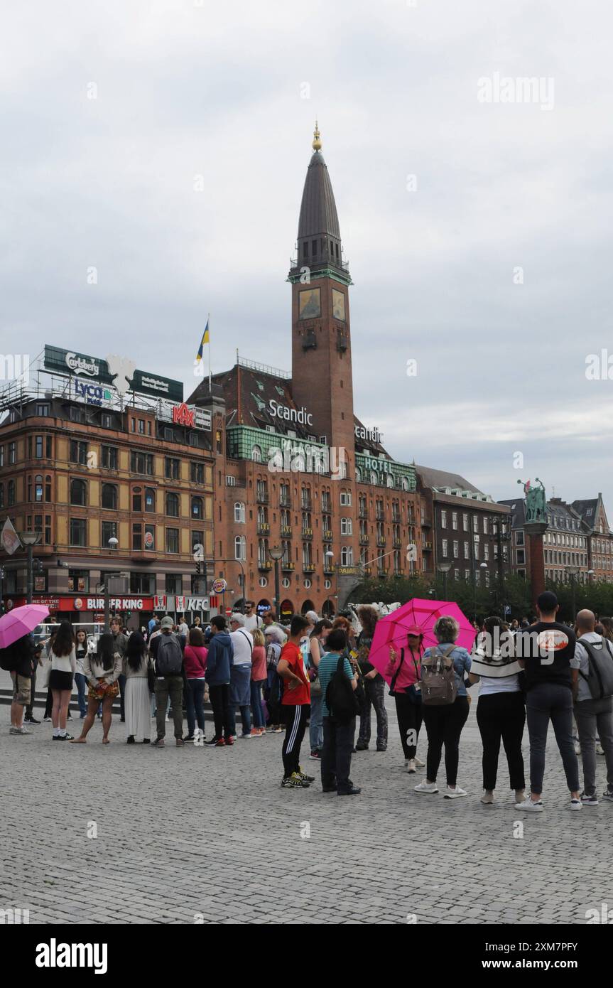 Copenhagen/ Denmark/26 July 2024/Pedestrain guide tour tourists in ...