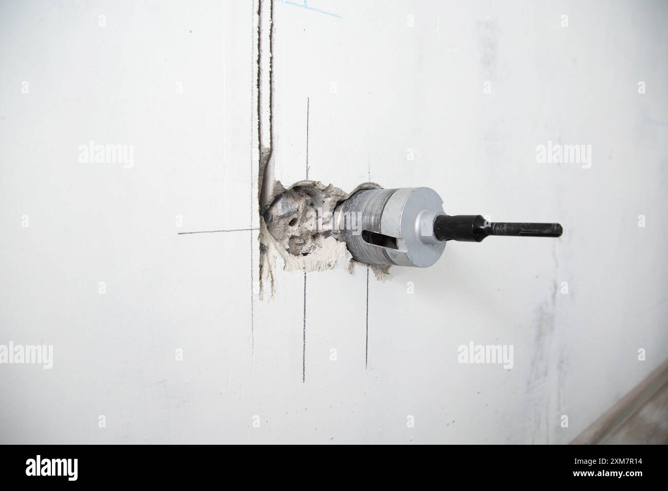 drilling holes in a concrete wall for socket boxes with a diamond core ...