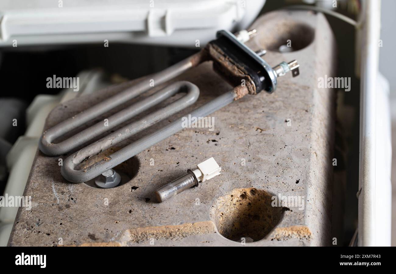 The electric heating element and temperature sensor, thermostat are on ...