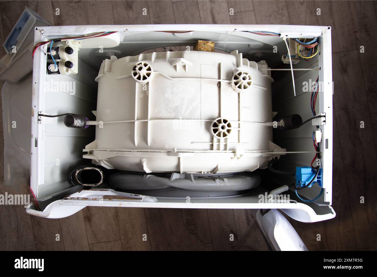 Top view of a disassembled washing machine. Replacing the washing ...