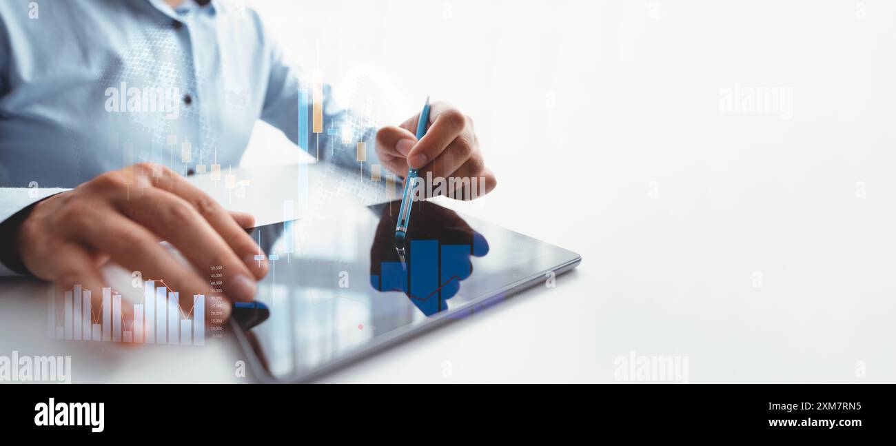 Businessman using tablet. Business and finance charts concept Stock ...