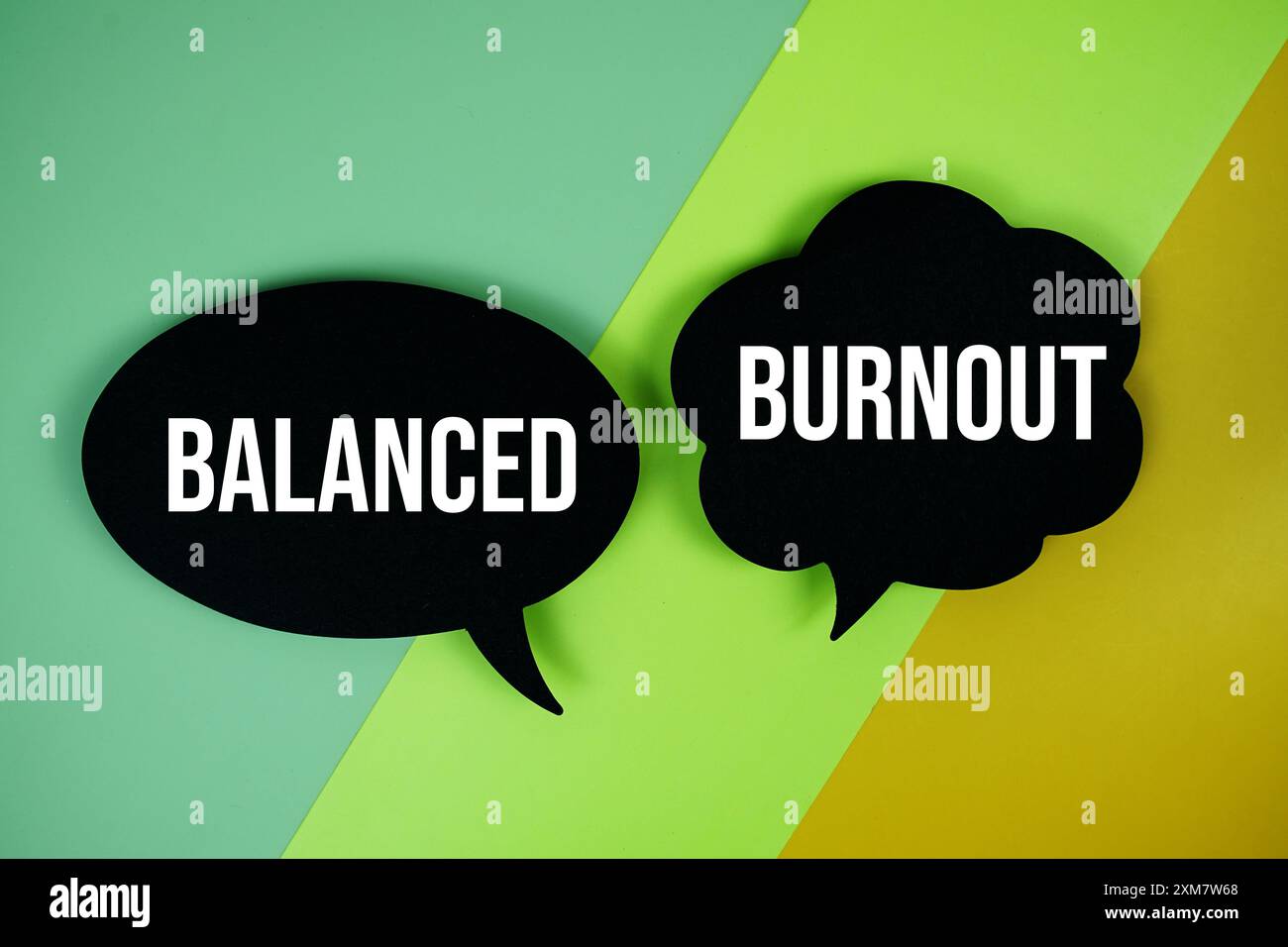 Balanced vs Burnout text on speech bubble top view on green and yellow ...