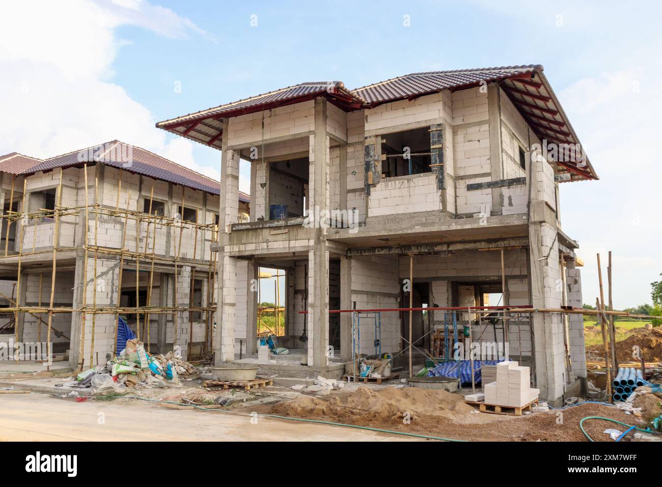 construction residential new house in progress at building site with ...