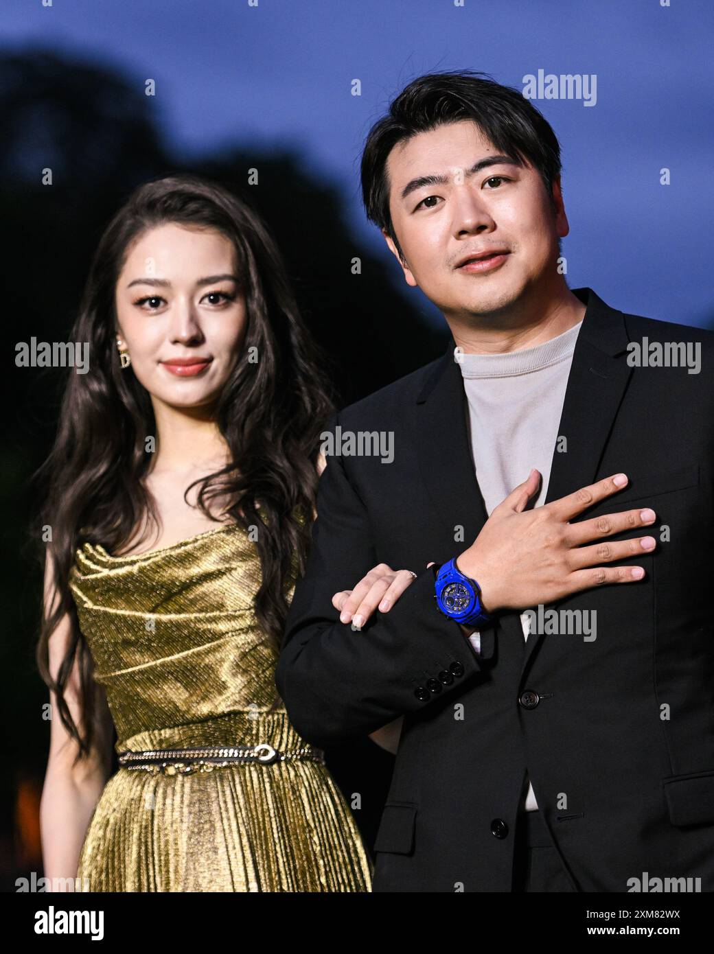 Paris, France. 26th July, 2024. Gina Alice Redlinger and Lang Lang posing for photos on the red ...