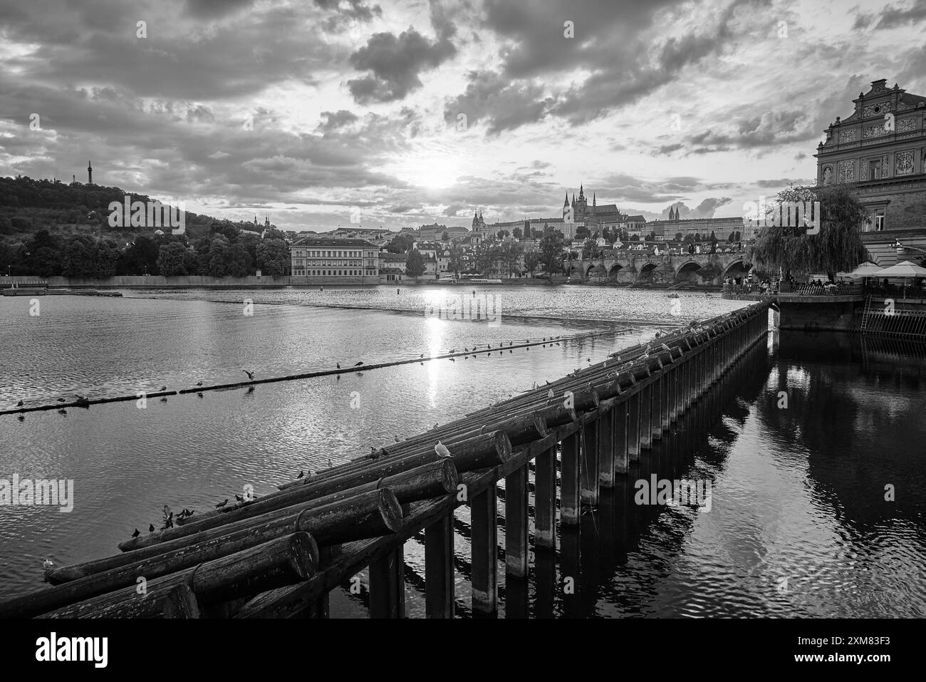 Sunset view of Prague castle, Vltava river and Mala strana district in ...